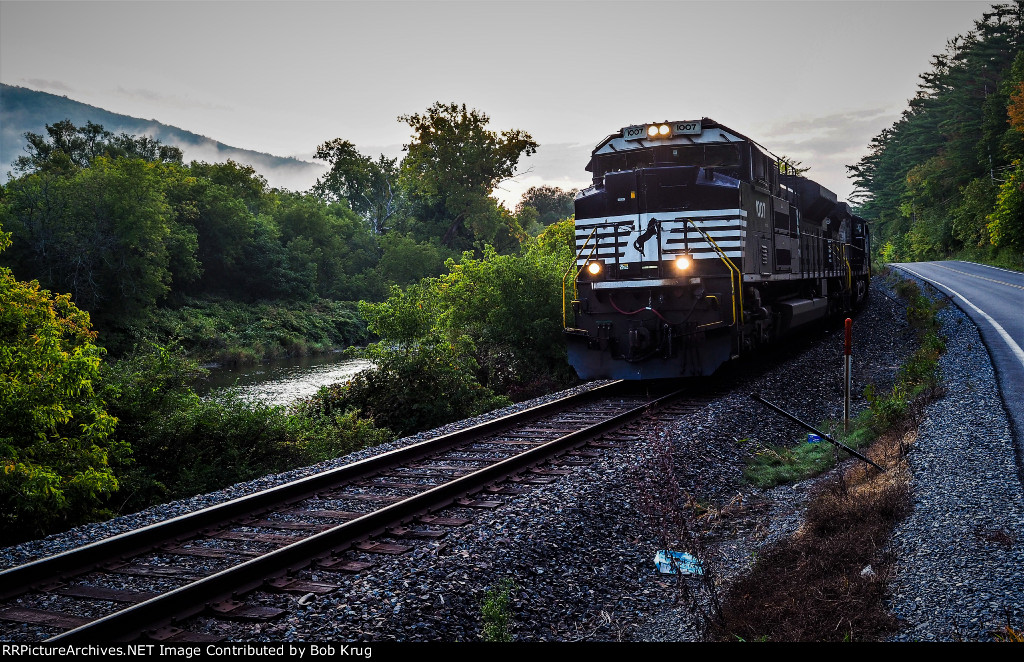 NS 1007 leads Train Symbol 11R along NY State route 346 on Pan Am Railways' trackage